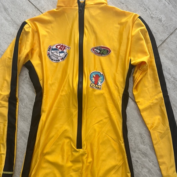 no brand listed | Other | Yellow And Black Racing Suit | Poshmark